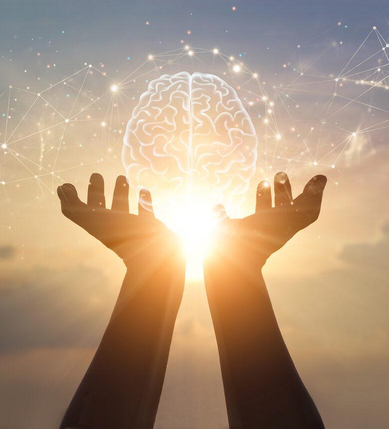 Abstract palm hands holding brain with network connections, innovative ...